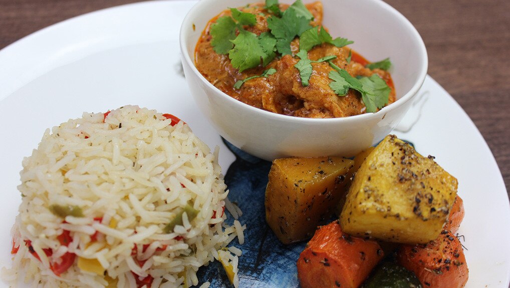 Buttered Chicken and basmati rice with sauteed peppers | BBC Africa